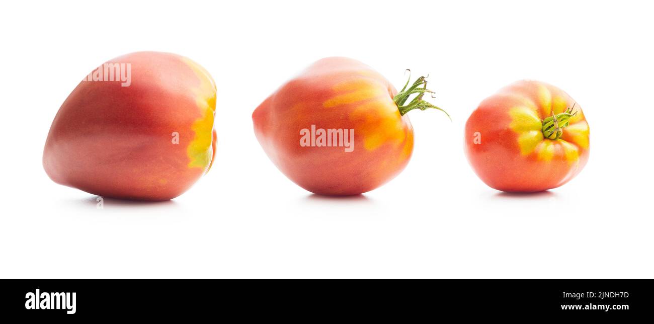 Bull heart tomatoes isolated on a white background Stock Photo - Alamy
