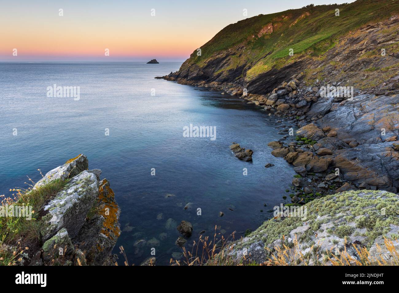 Gull Rock from Jacka Point at Portloe on the Cornish coast. Captured ...