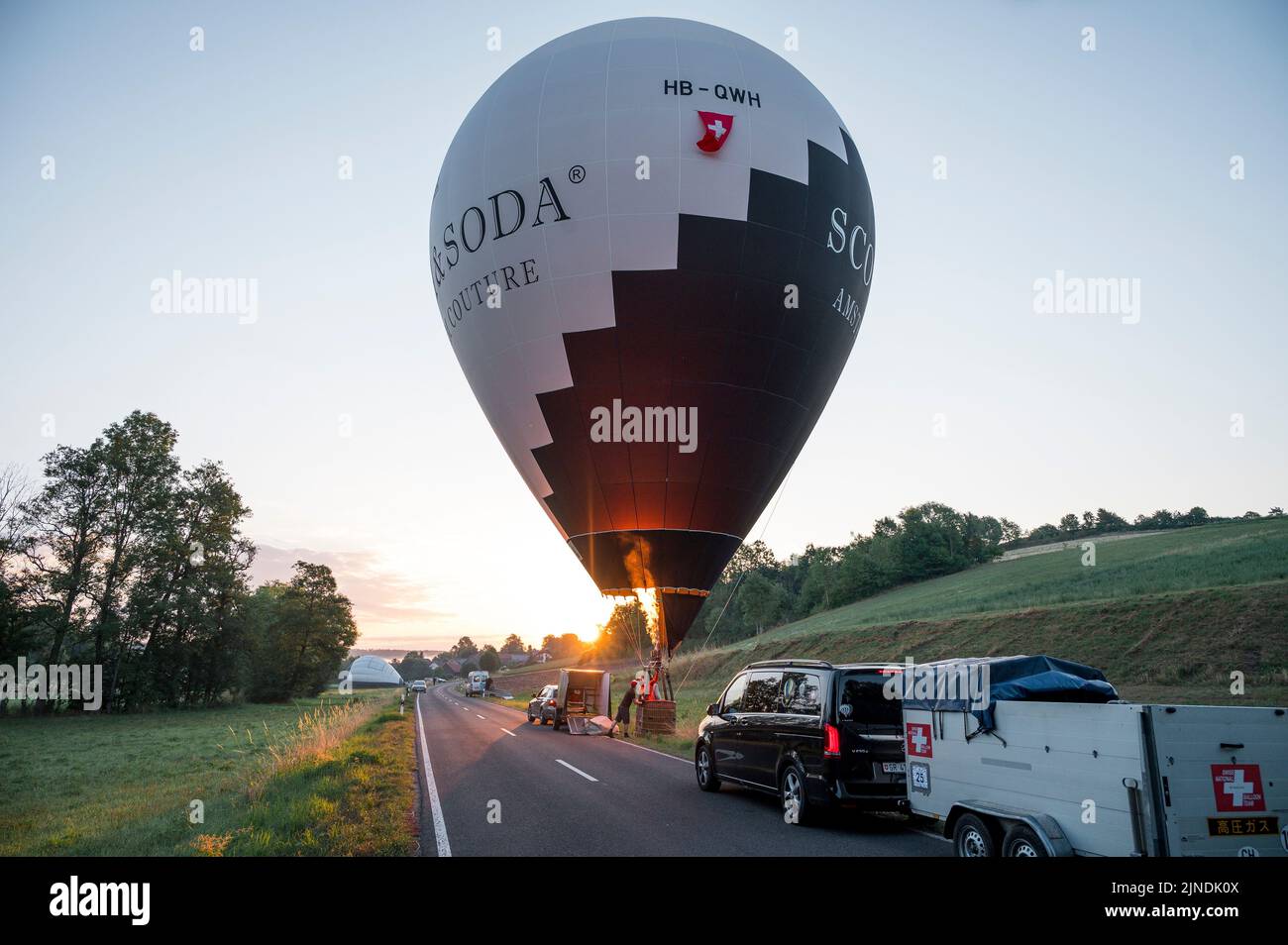 Heldburg, Germany. 11th Aug, 2022. A hot air balloon is prepared for ...
