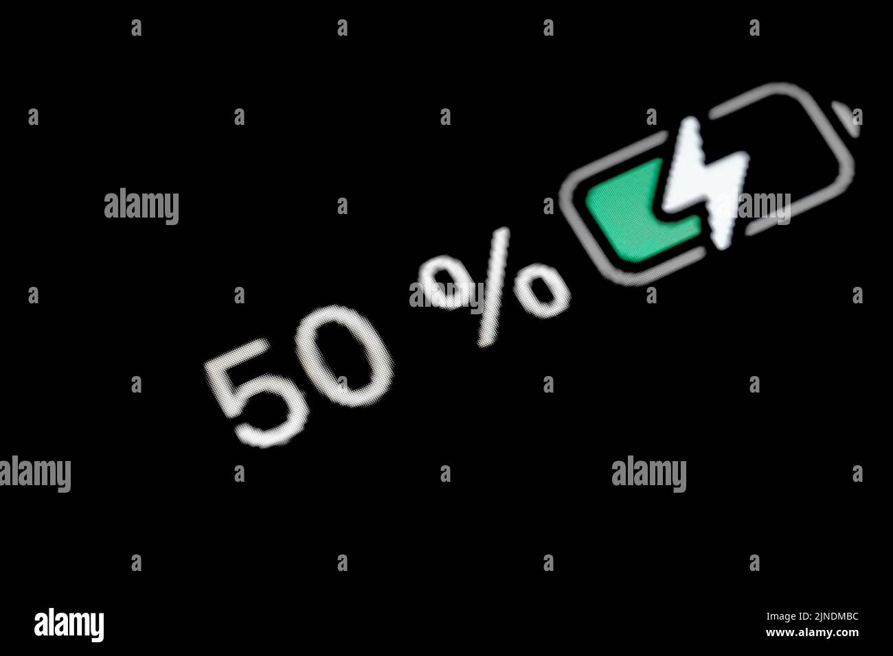 Battery level indicator charging process - white number - fifty, 50 ...