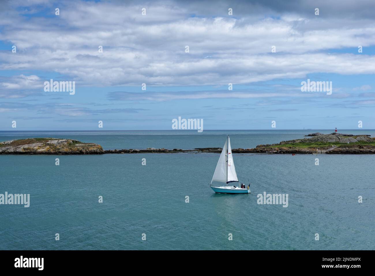 A yacht navigating the waters between Coliemore Harbour and Dalkey ...