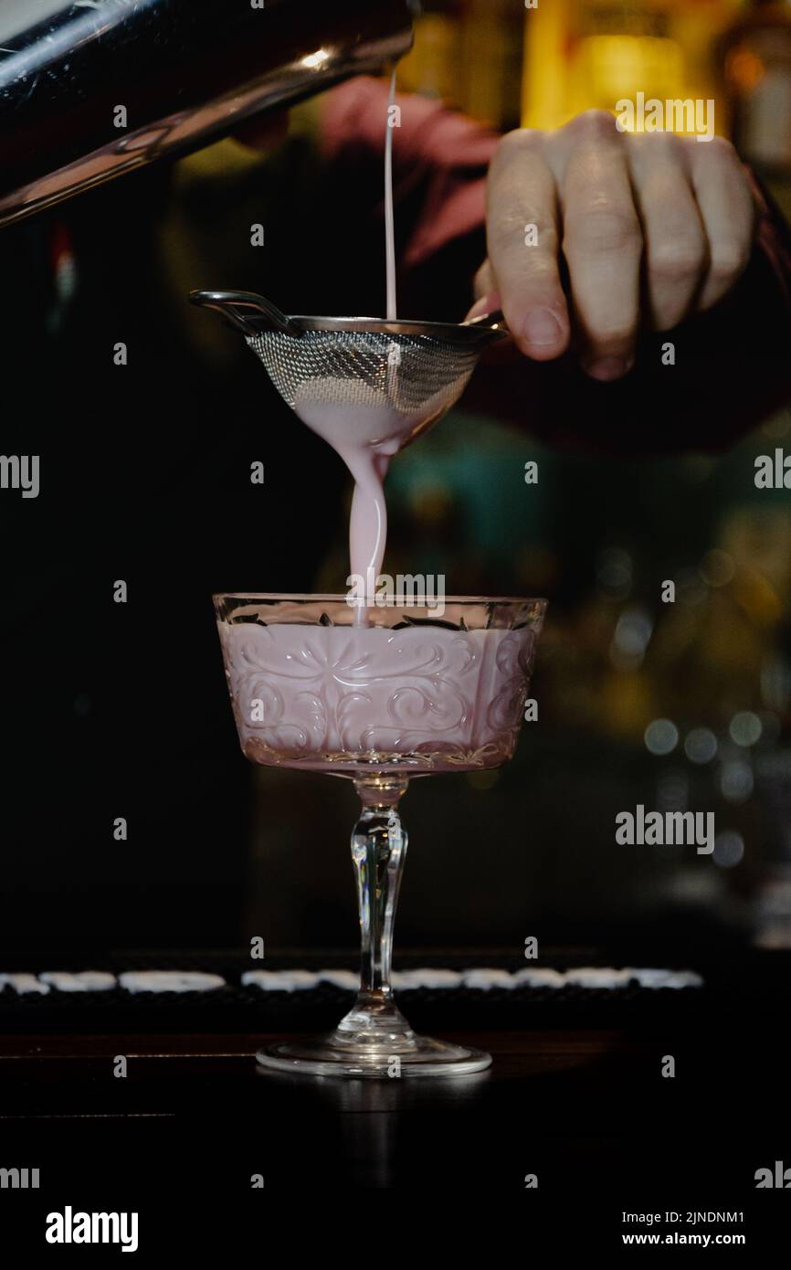 Bartender preparing alcoholic cocktail ice hi-res stock photography and ...