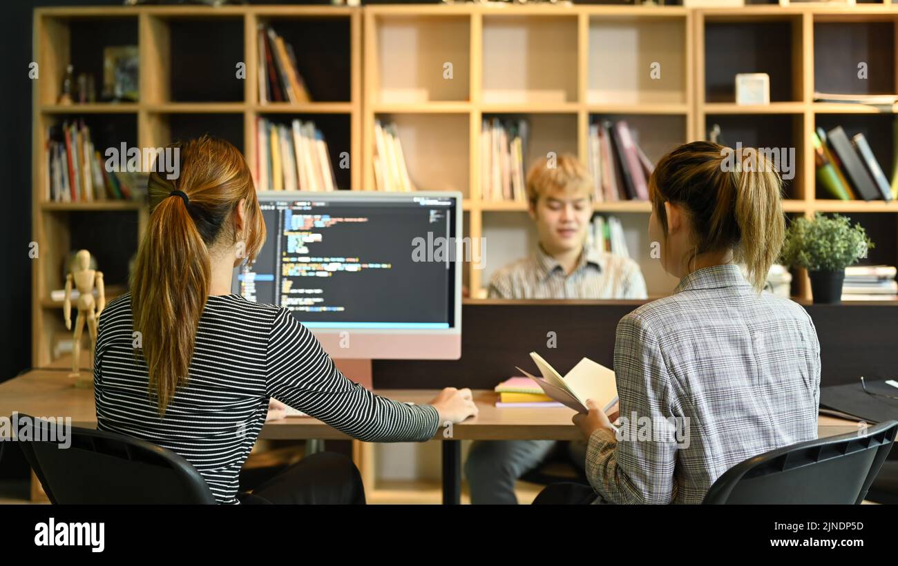 Creative Software Development Team Working With Data Debugging Improvement Binary Algorithm Code