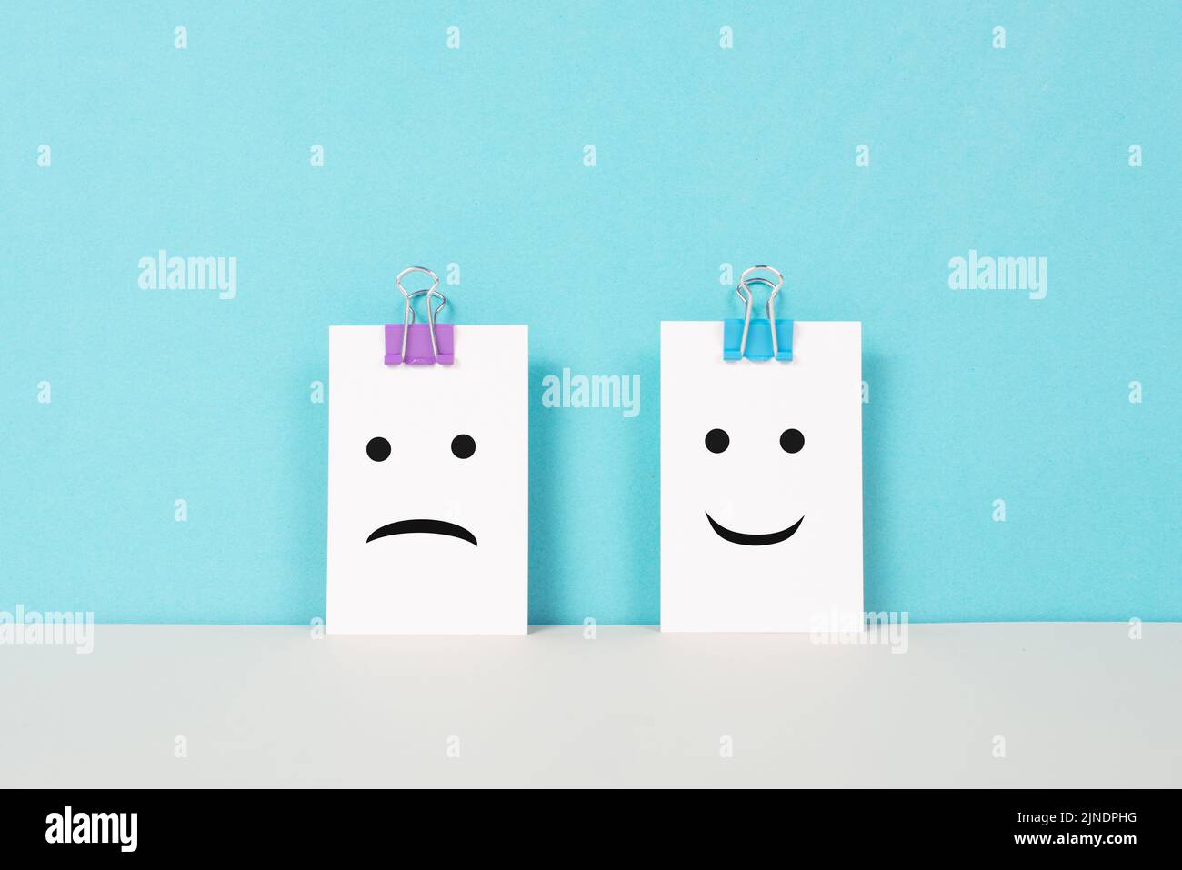 Head with a sad and a happy face, mental health concept, positive and ...