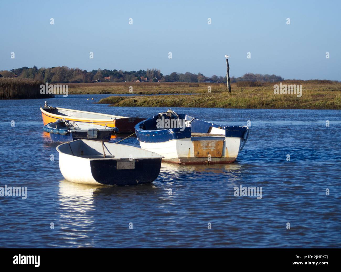 Small boats at Brancaster Staithe harbour North Norfolk October 2020 ...