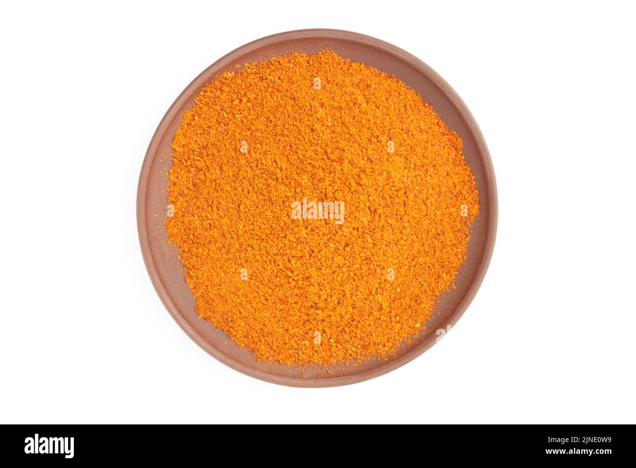 Red chili pepper in clay plate isolated on white. Macro. Flat lay. Diet ...