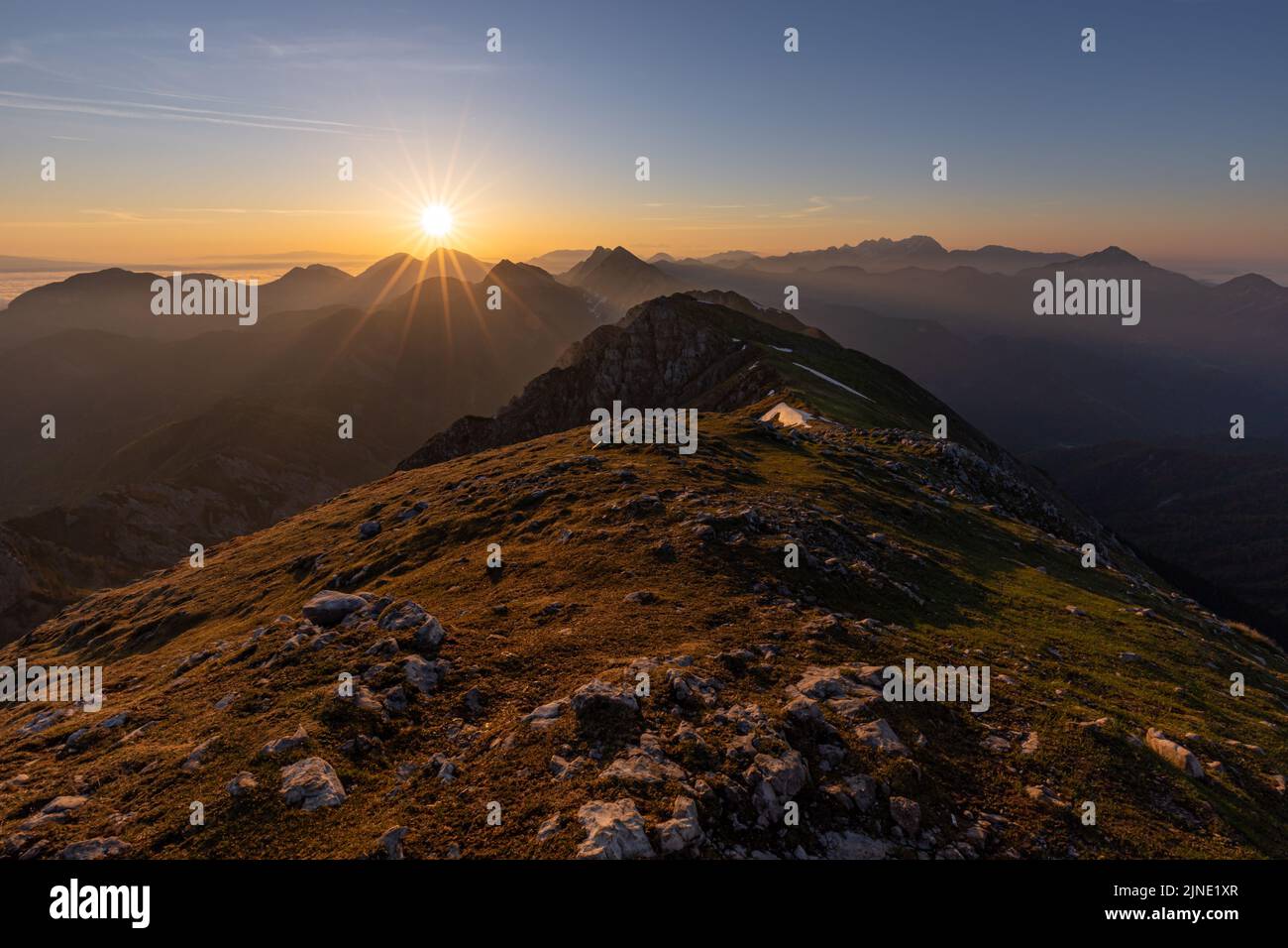 The picturesque sunrise of an alpine valley ,on Karavanke mountain ...