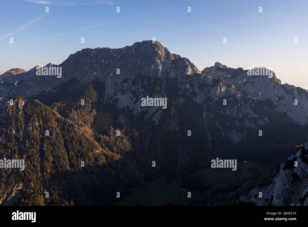 The picturesque sunrise of an alpine valley ,on Karavanke mountain ...