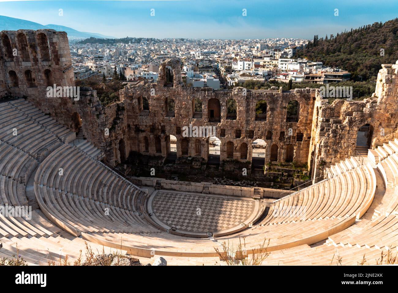 A scenic view of the Acropolis of Athens, Greece with forests in the ...