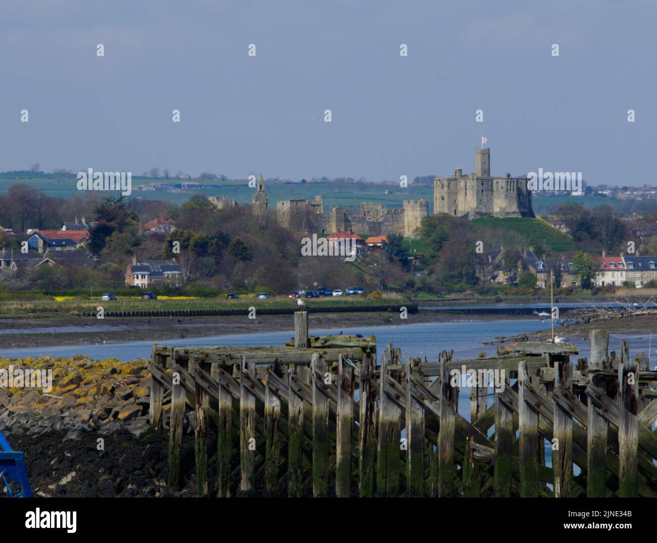 Amble harbour looking towards Warkworth and castle April 2022 Stock ...