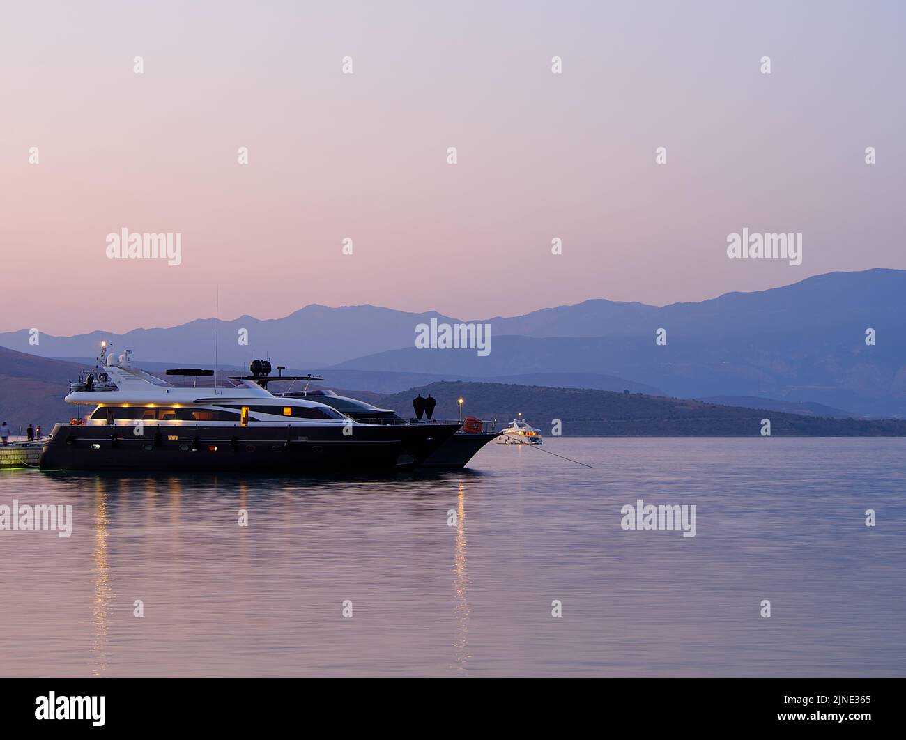 Yacht in sunset colours, Galaxidi, Greece Stock Photo - Alamy
