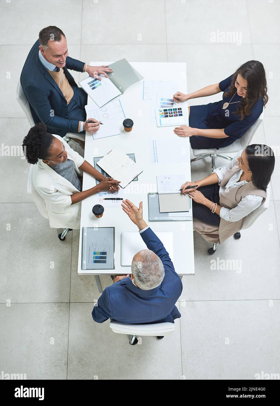 Teamwork, talking and meeting group of corporate colleagues planning ...