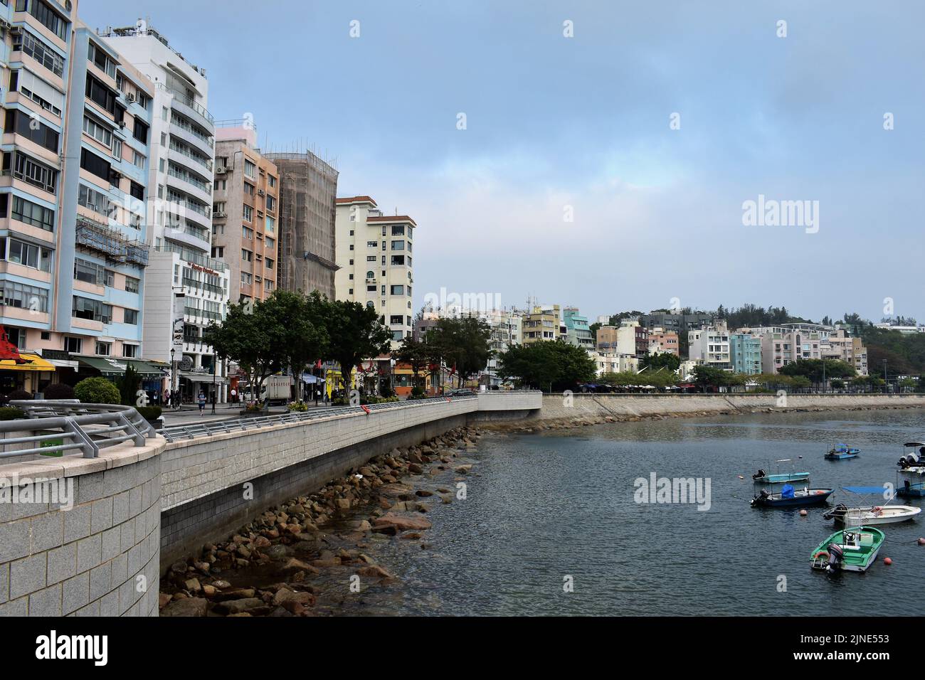 Rocky sea shore of Stanley Bay in Hong Kong city. Beautiful scenic ...