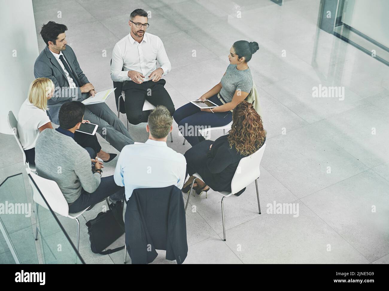 Support, care and unity by colleagues in a business meeting, sitting ...