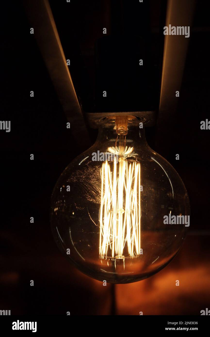 Round Filaent Bulb Lamps With Hot Spirals Inside Stock Photo - Alamy