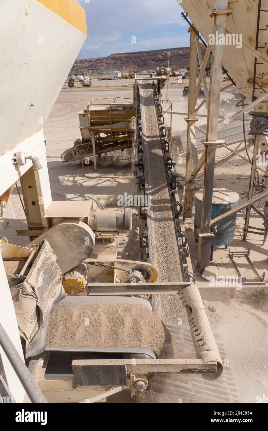 A conveyor carrying aggregate from the cold feed unit to the rotary ...