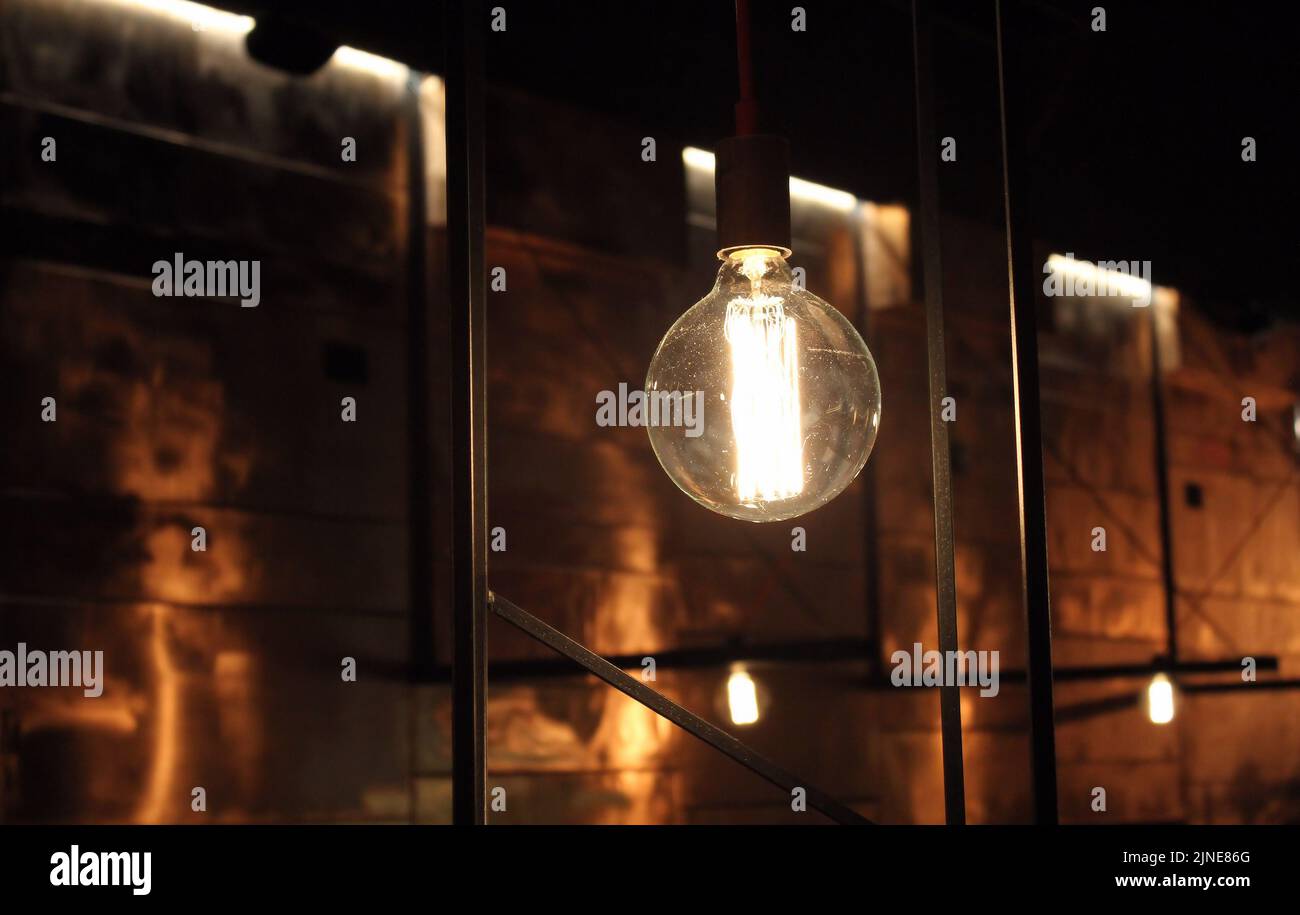 Filament Lamp With Red Hot Spiral Inside Stock Photo - Alamy