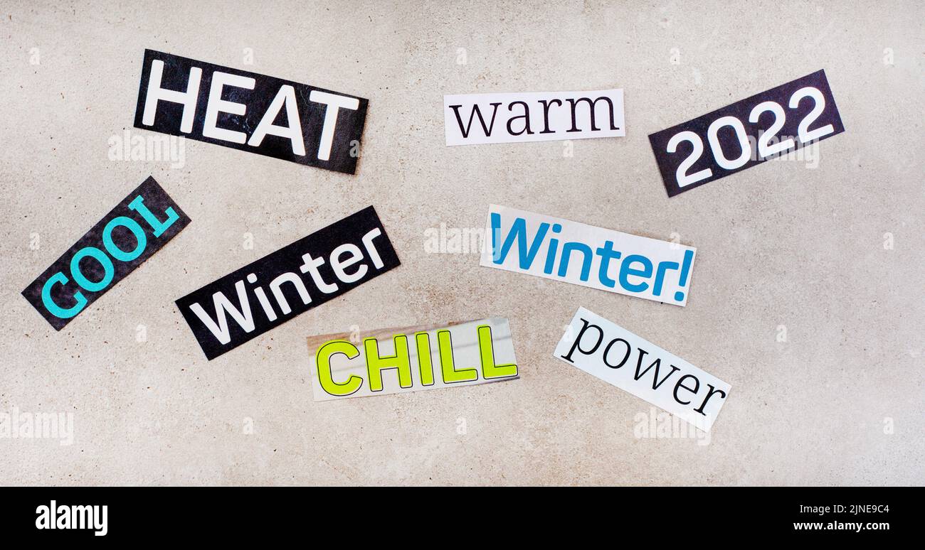 European power crisis and cold winter ahead, magazine clippings on grey ...