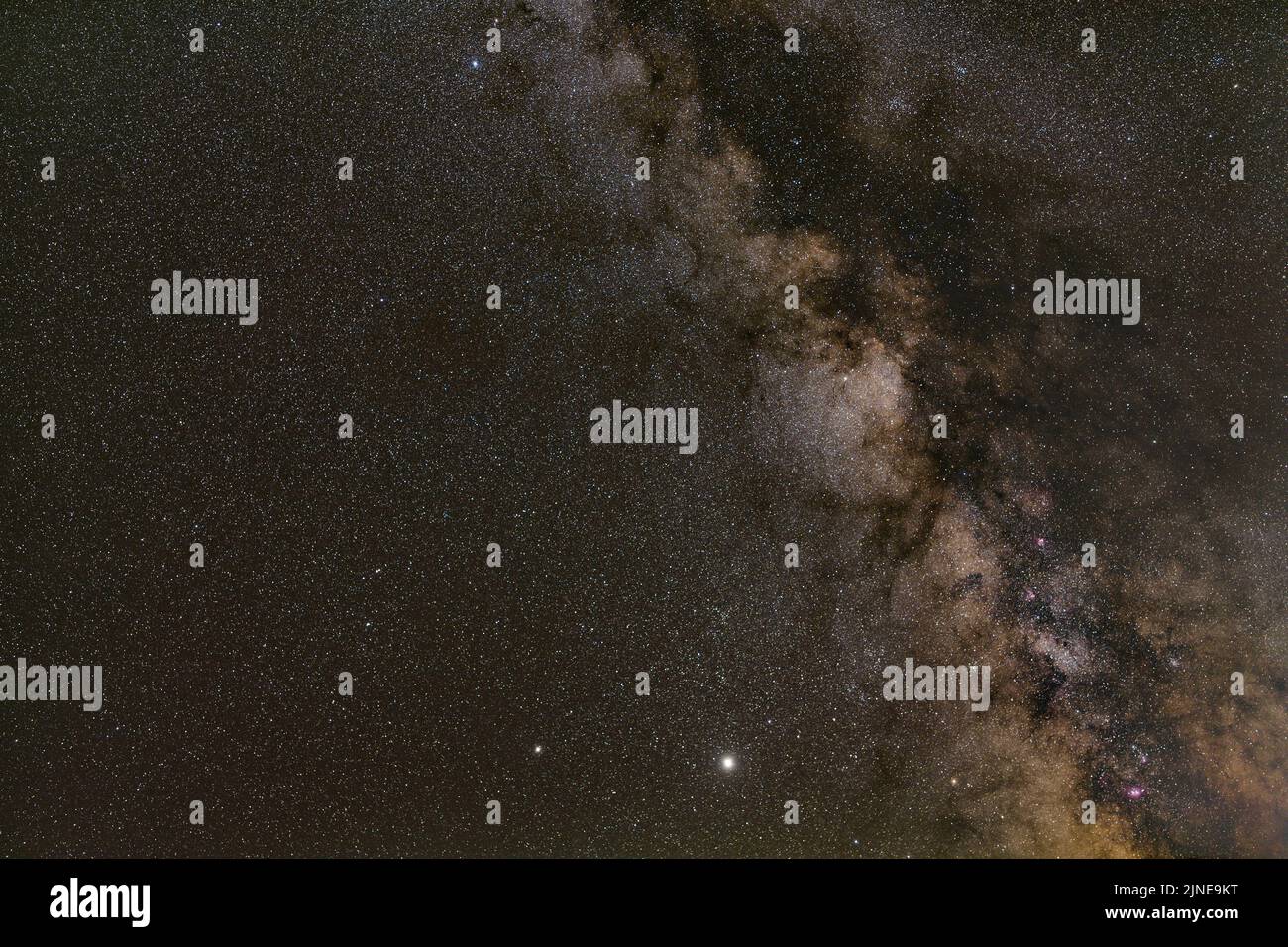 Night sky with many stars, milky way galaxy near Scutum and Aquila constellation, purple nebulas ...