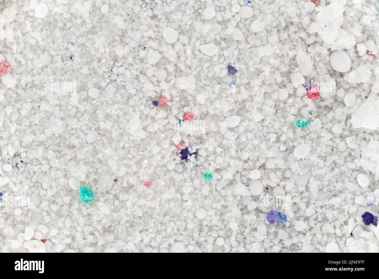 Washing powder under microscope - image width 23mm, colourful granules ...