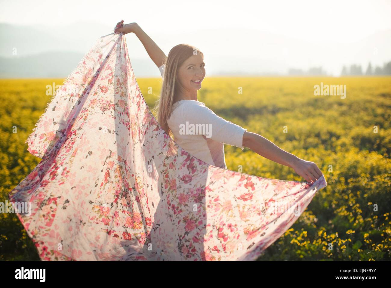 Scarf blowing in wind hi-res stock photography and images - Alamy