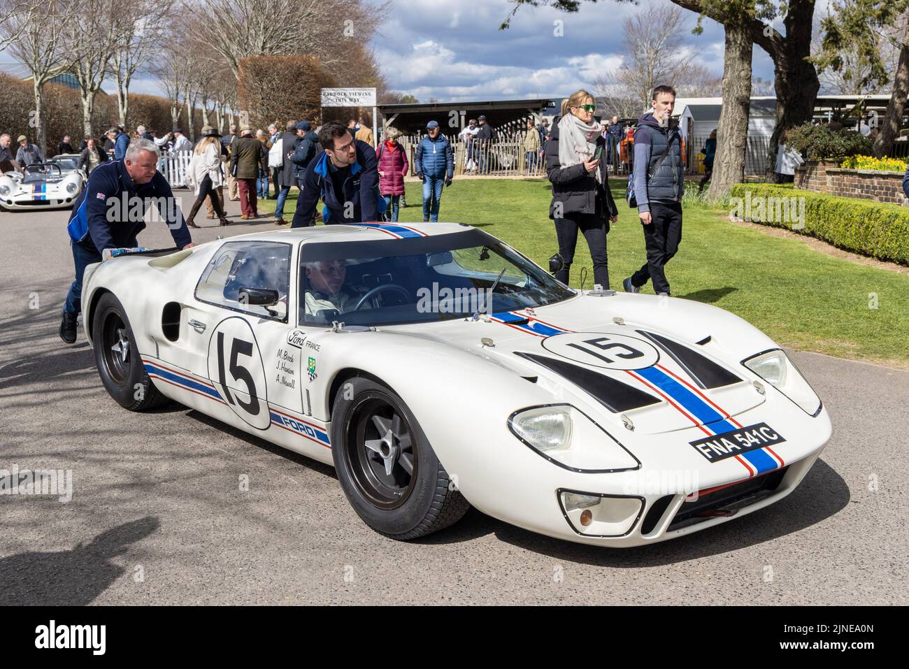 The 1965 Ford GT40 of Martin Birch moves through the paddock prior to ...