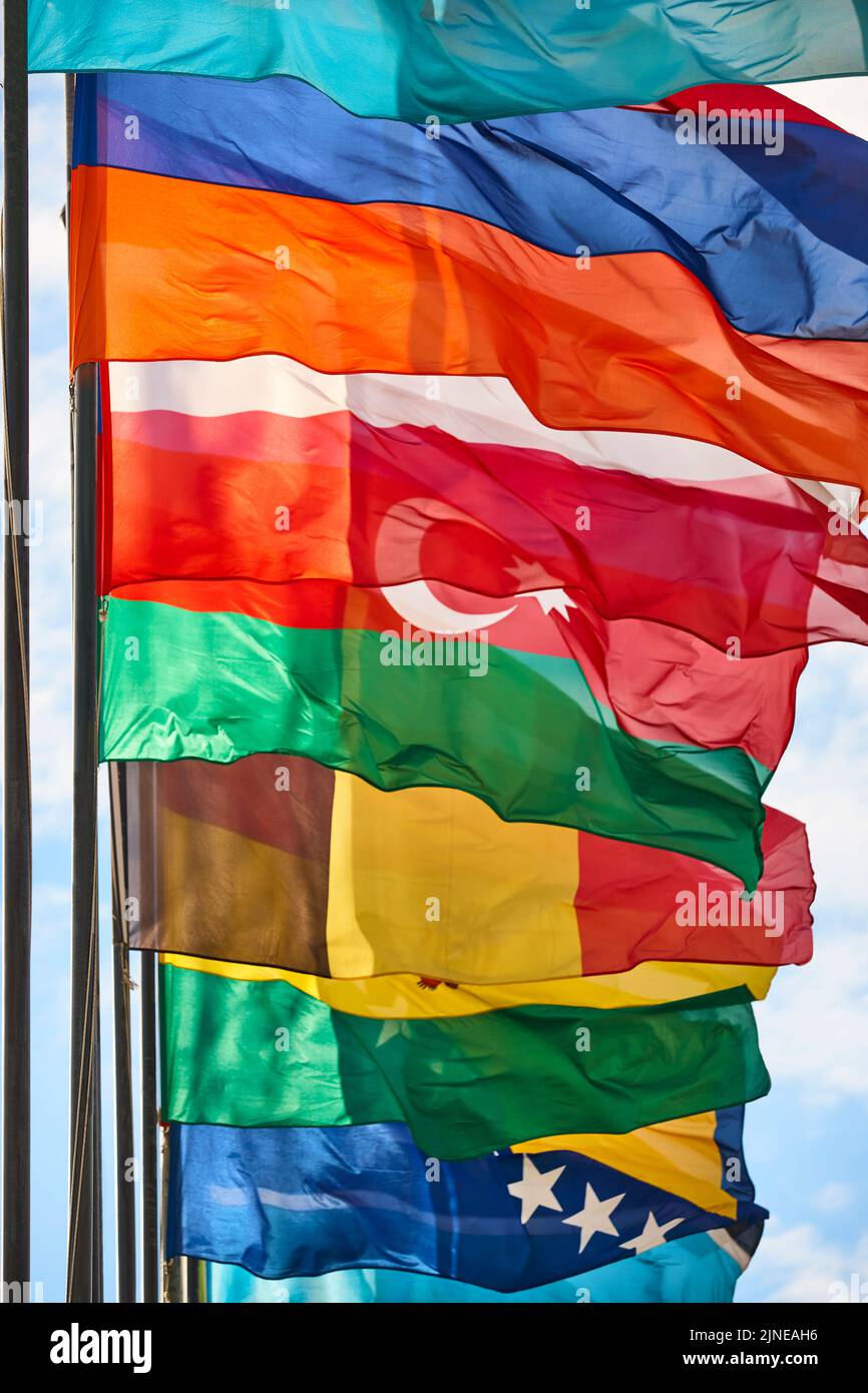 Flags of the word waving in the wind. Nation emblems Stock Photo - Alamy