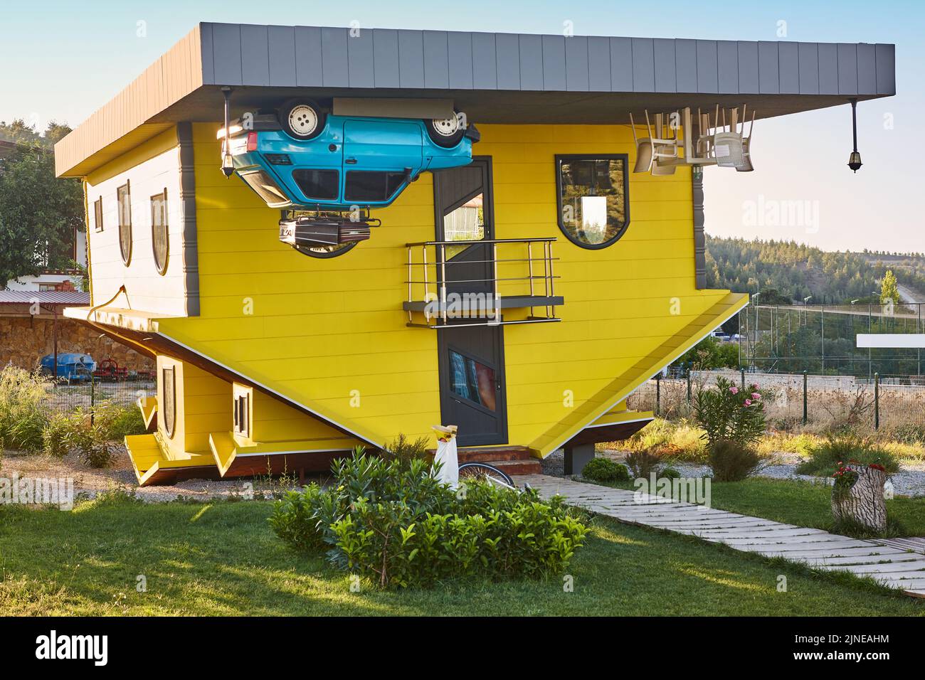 Weird upside down house. Bizarre wooden home. Funny architecture Stock ...