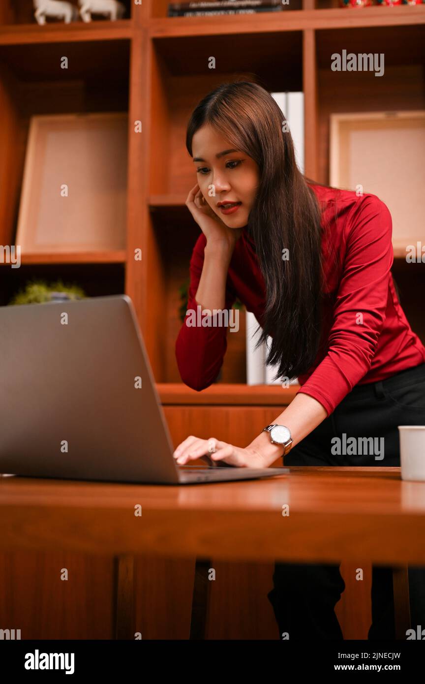 A professional and talented millennial Asian businesswoman or female ...