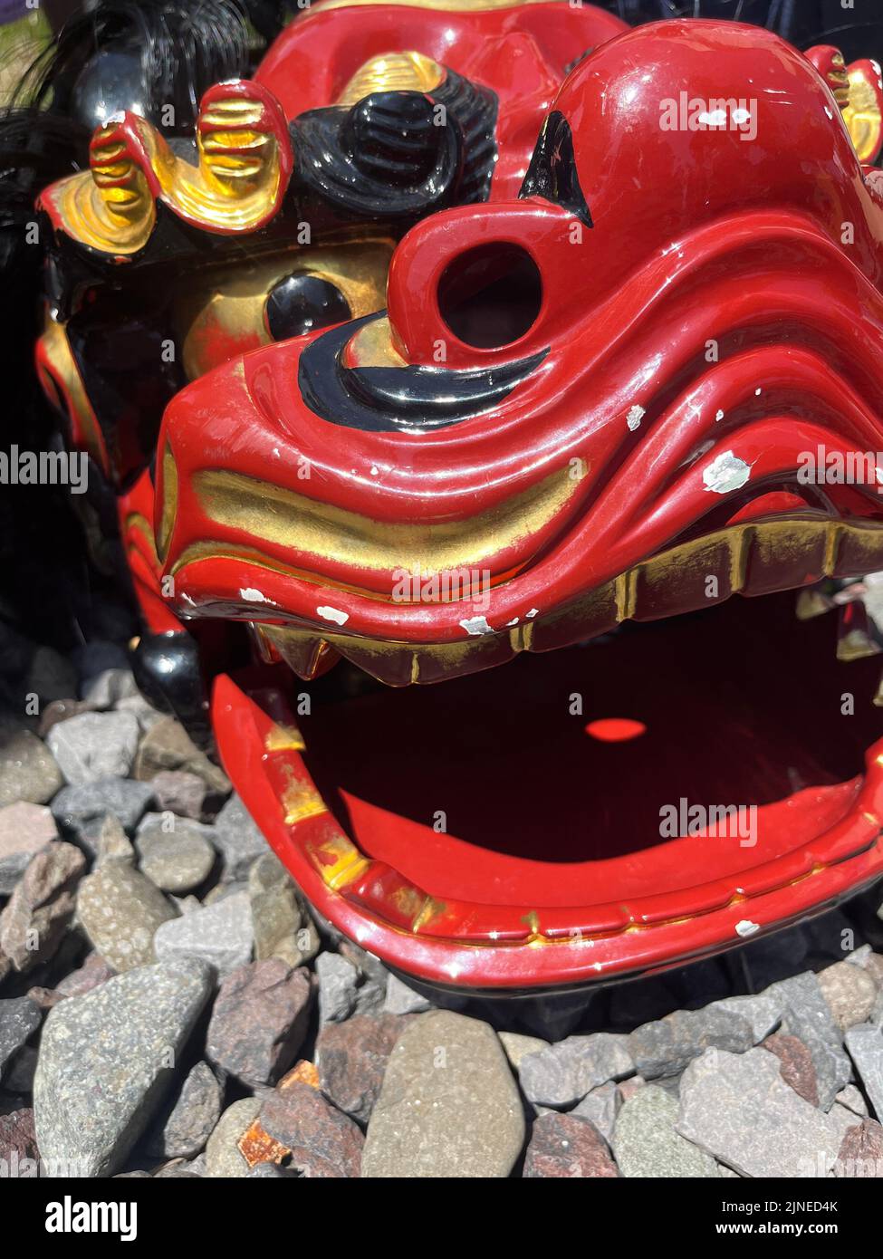 Red shishi lion head Japanese festival mask Stock Photo - Alamy