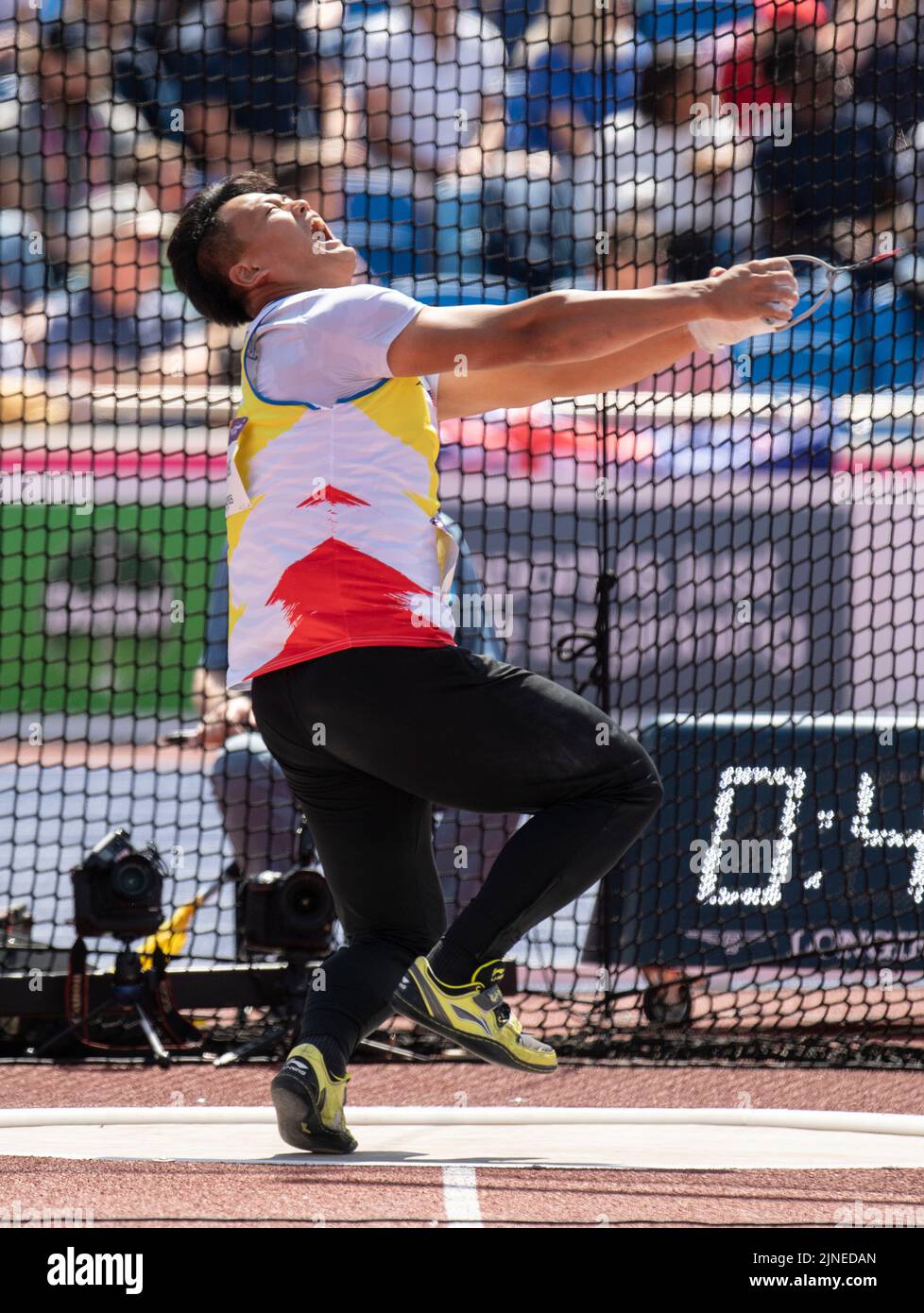 Jackie Wong Siew Cheer of Malaysia competing in the men’s hammer final ...