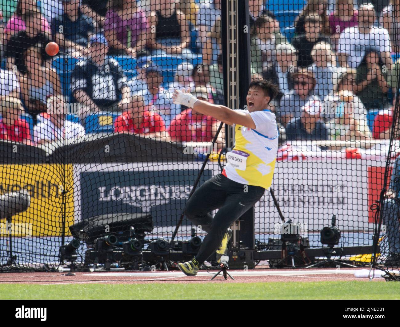 Jackie Wong Siew Cheer of Malaysia competing in the men’s hammer final ...