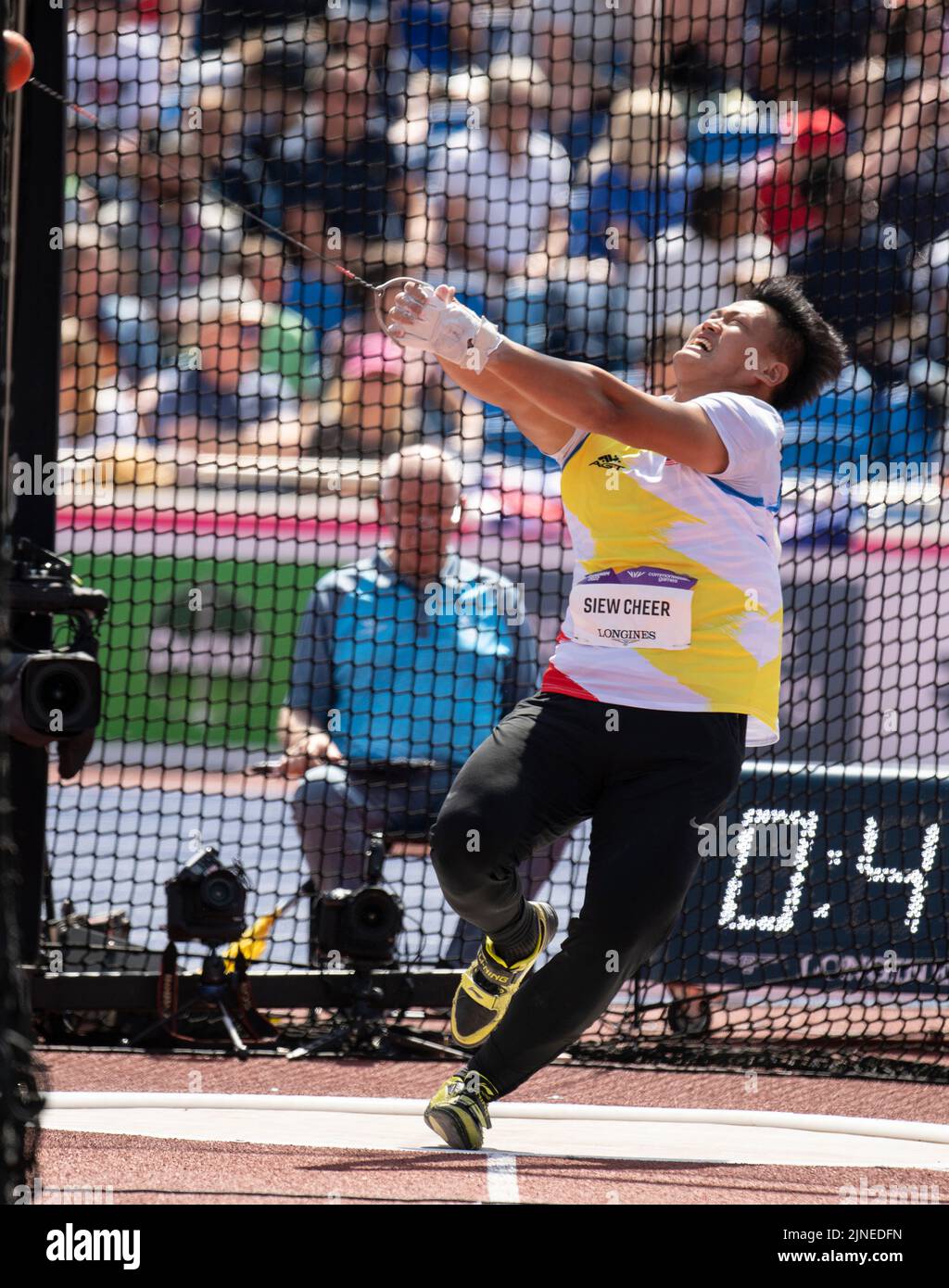 Jackie Wong Siew Cheer of Malaysia competing in the men’s hammer final ...