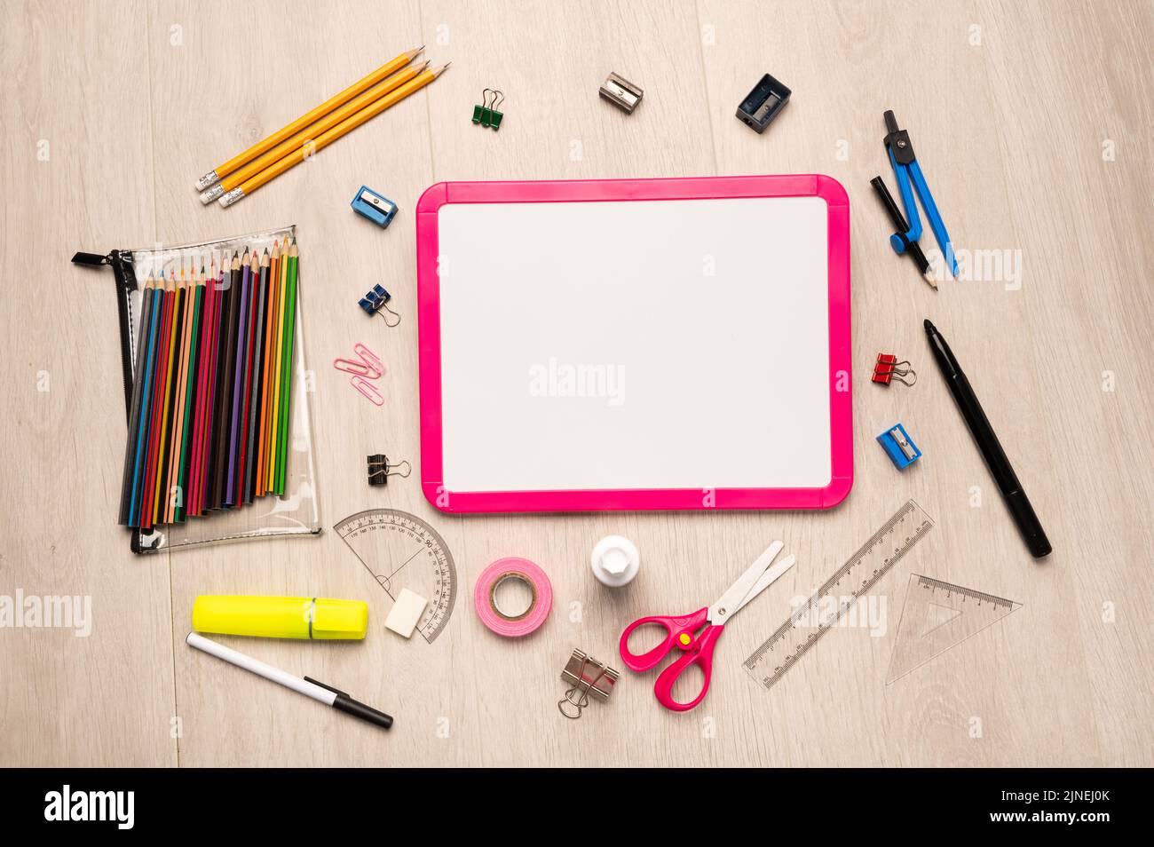 Back to school supplies, school stationary items on a light wood ...