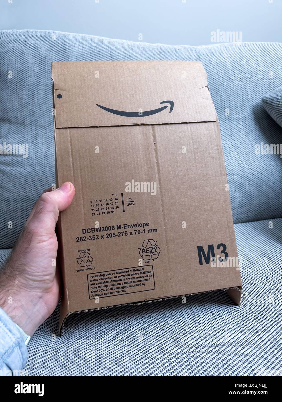 Paris, France - Jan 27, 2022: Amazon Prime cardboard package with M3 ...