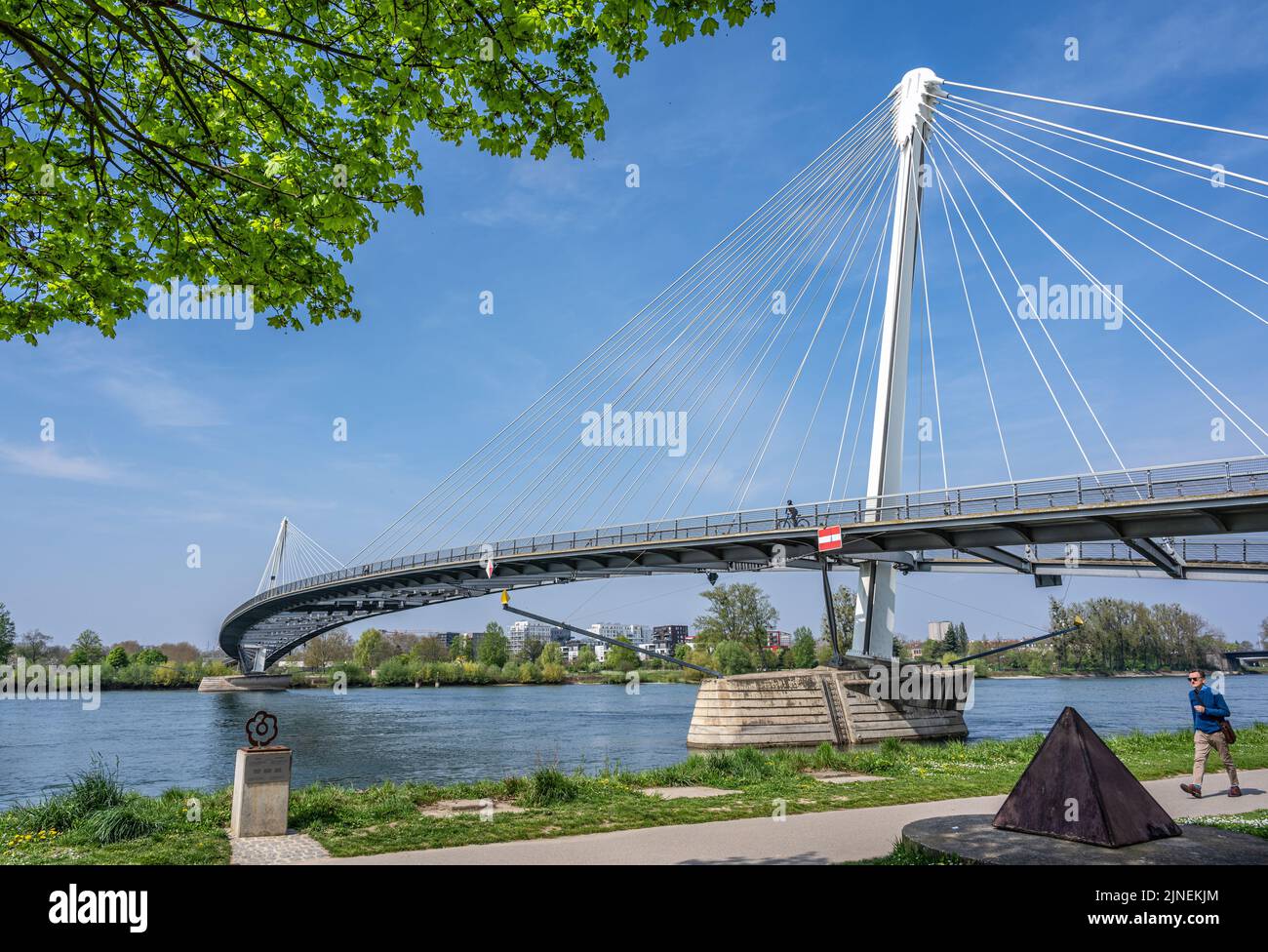 Curved suspension footbridge connecting the town of Kehl in Germany to ...