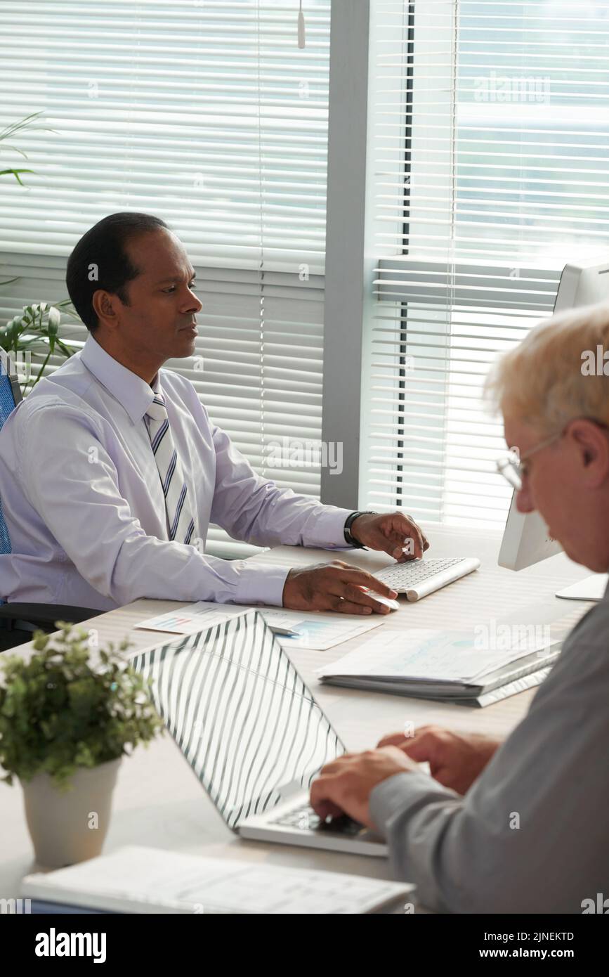 Business people busy with work on project in office Stock Photo - Alamy