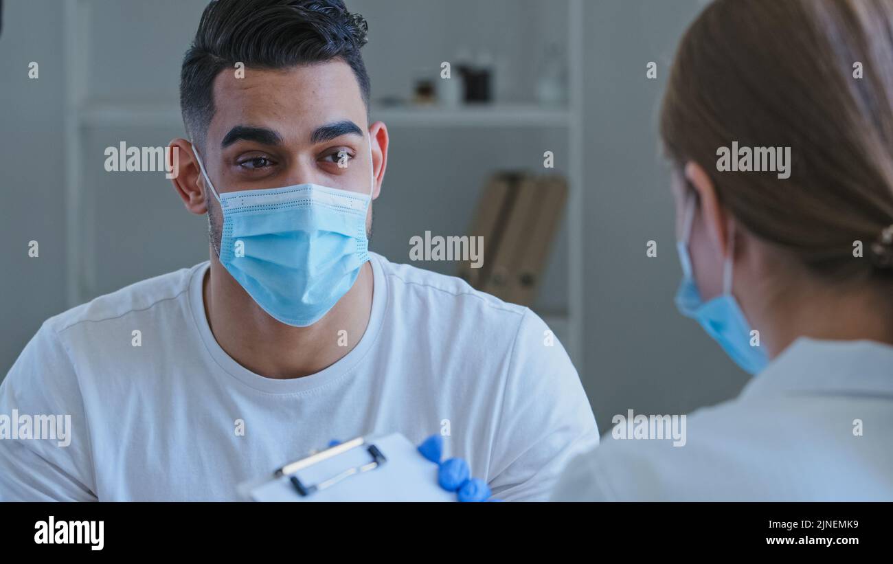 Arabic man hispanic guy patient sick male wears medical protective mask ...
