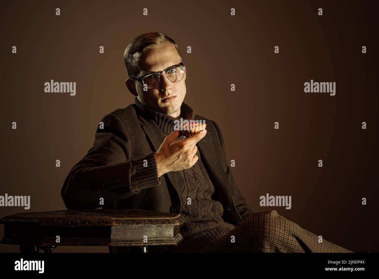 Retro style portrait of young man, writer and traveler wearing vintage ...