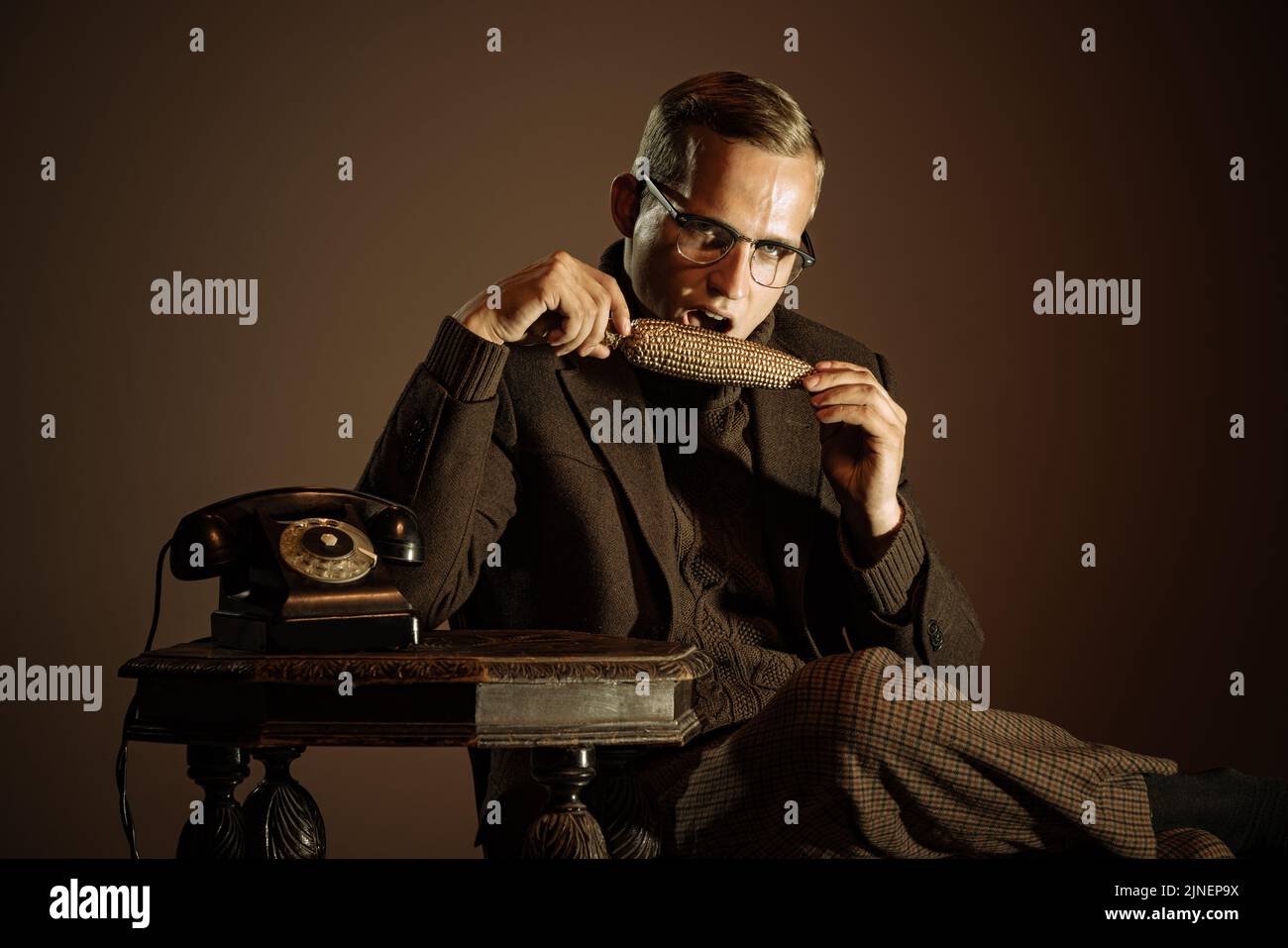 Retro style portrait of young man, writer and traveler wearing vintage ...