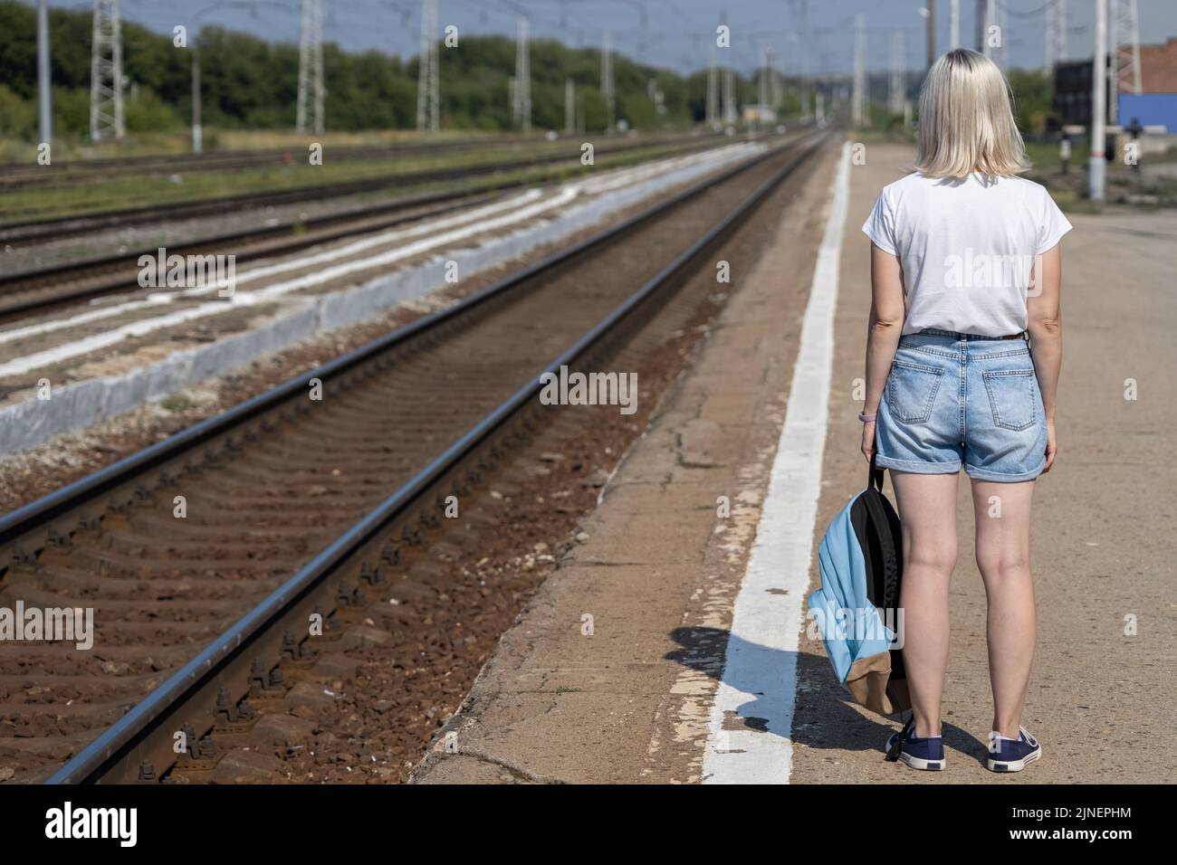 Ryazan, Russia - July 25, 2022: a woman stands on an empty platform ...