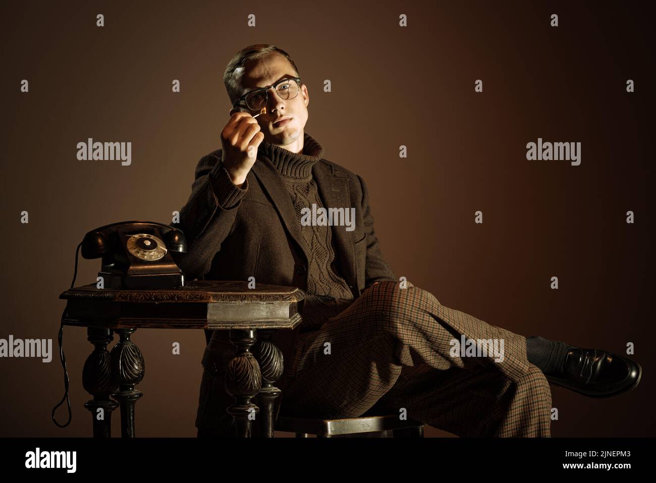 Retro style portrait of young man, writer and traveler wearing vintage ...