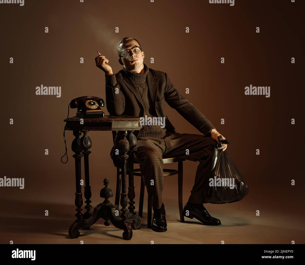 Retro style portrait of young man, writer and traveler wearing vintage ...