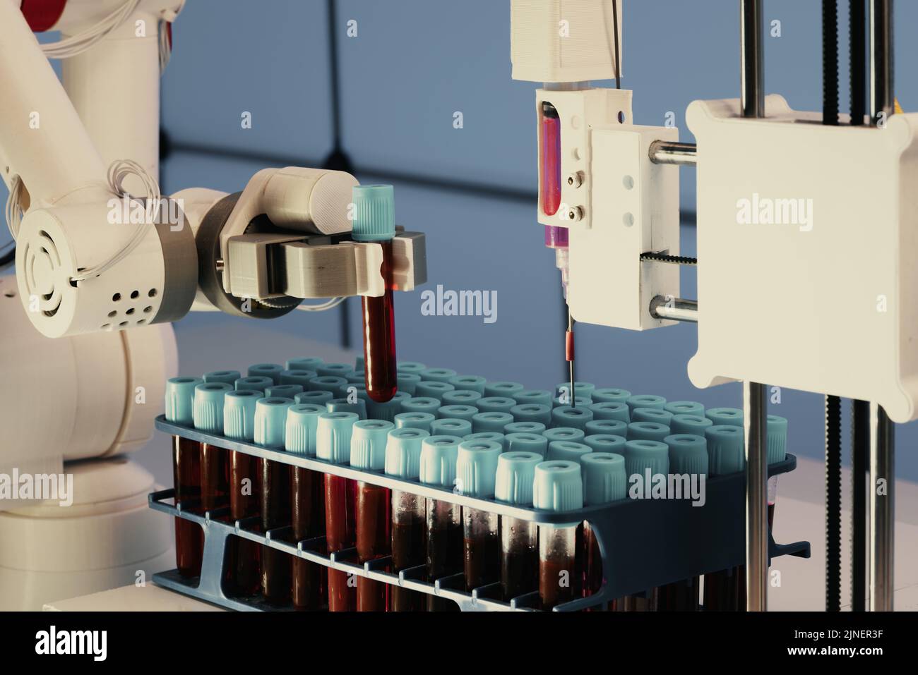 modern genetic laboratory PCR processor and robot with test tube in ...