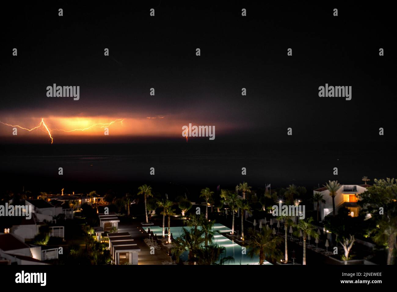 A beautiful view of a thunder over a city Stock Photo - Alamy