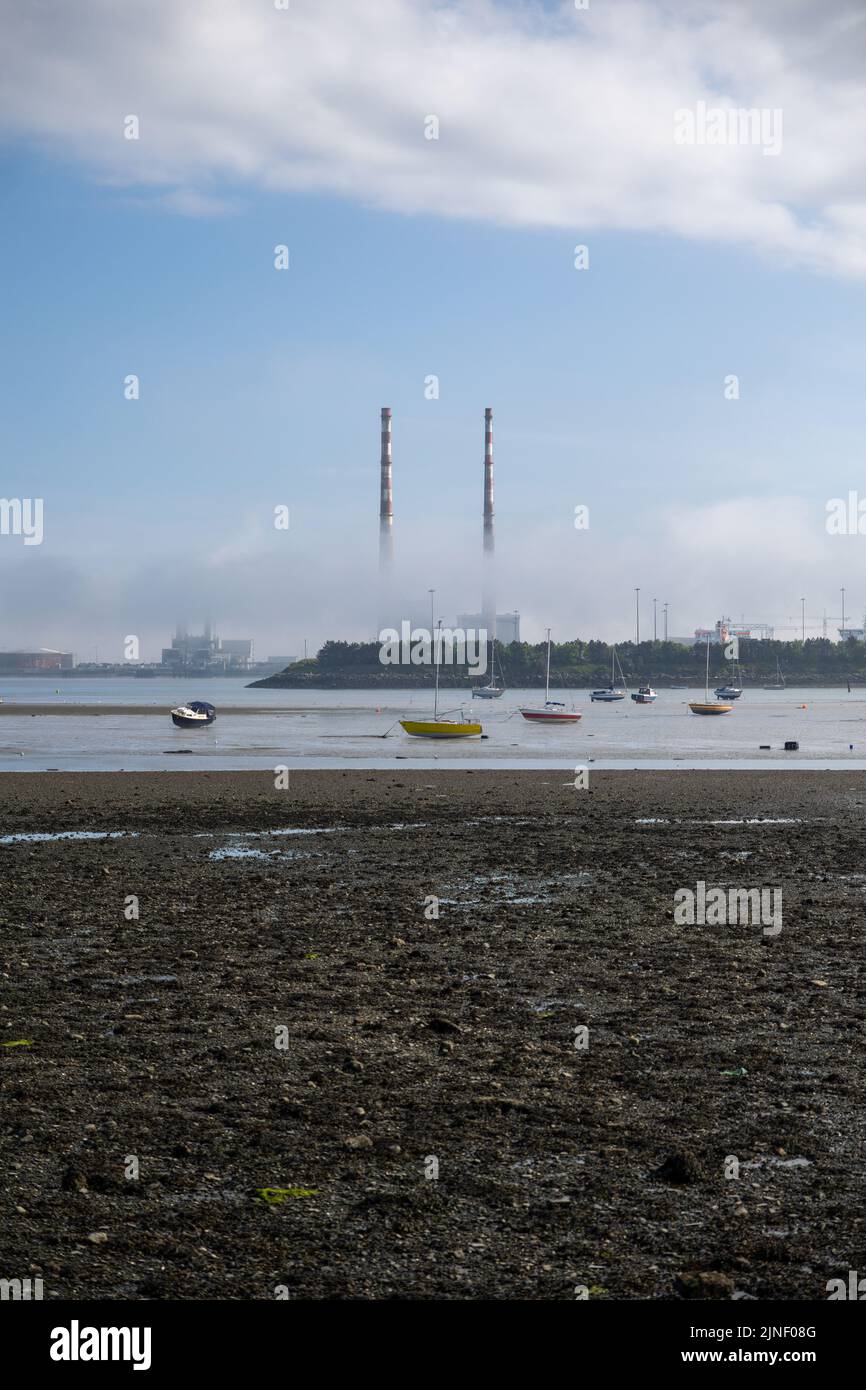 A vertical shot of the Poolbeg towers in Dublin Stock Photo - Alamy