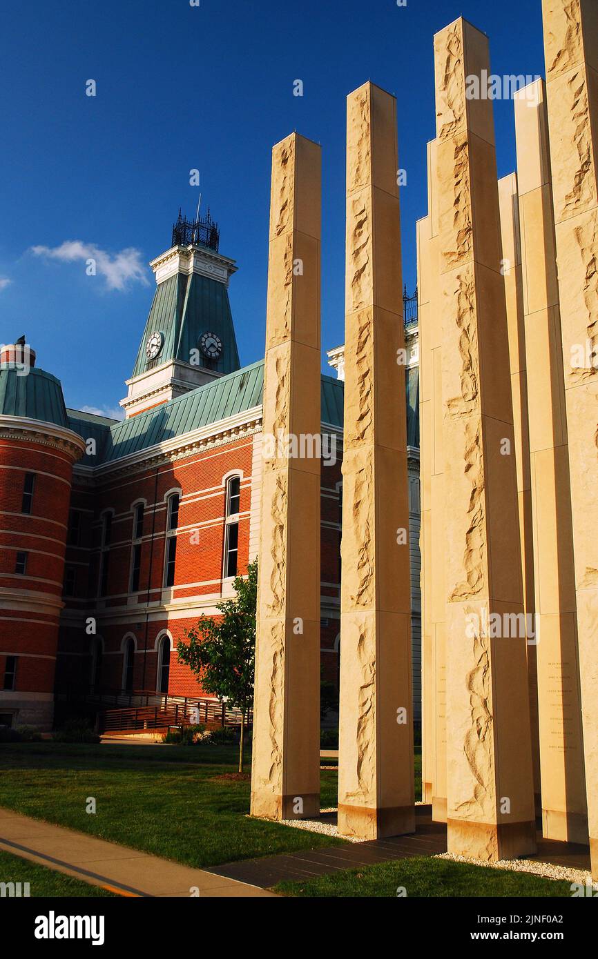 Limestone pillars serve as a Veterans Memorial on the grounds of the ...