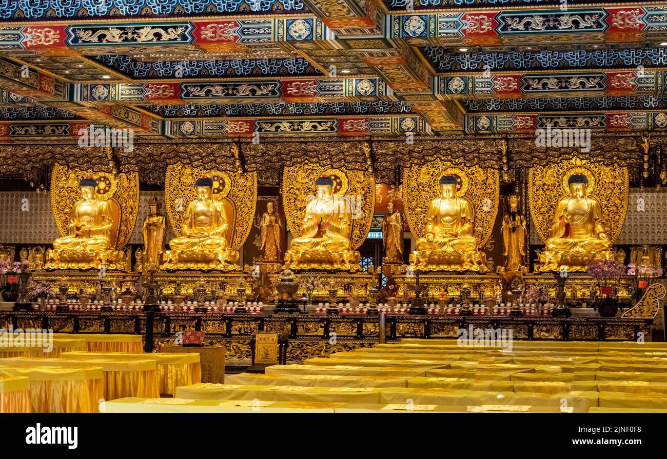 The golden statues in the Buddha temple Stock Photo - Alamy