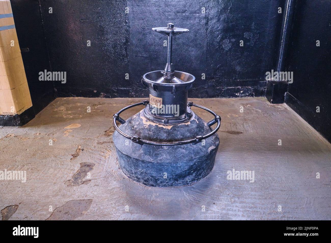 A central floor water cleaning station for washing down dirty miner ...