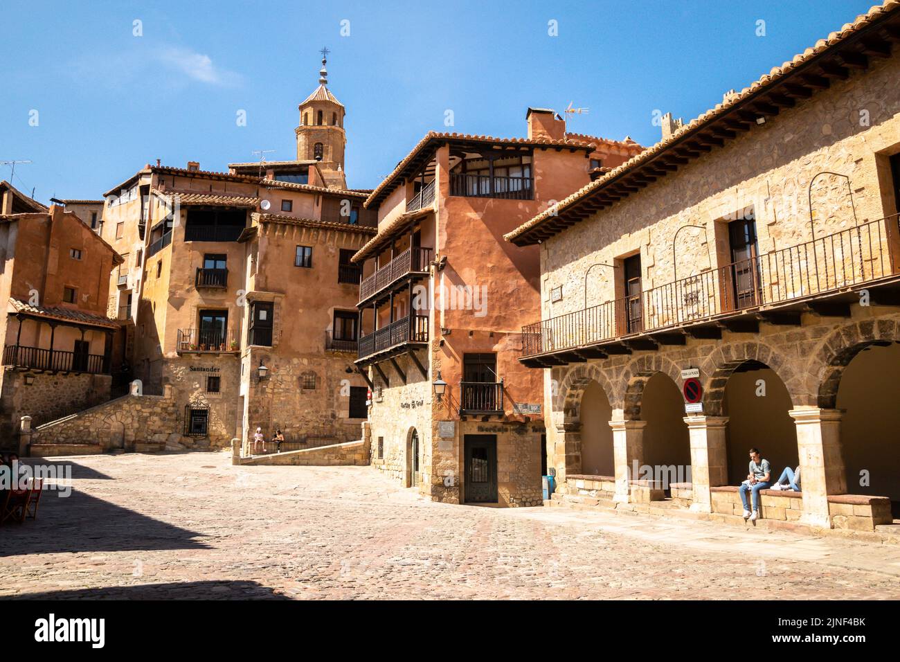 Red stone buildings around the plaza in Albarracin Stock Photo - Alamy